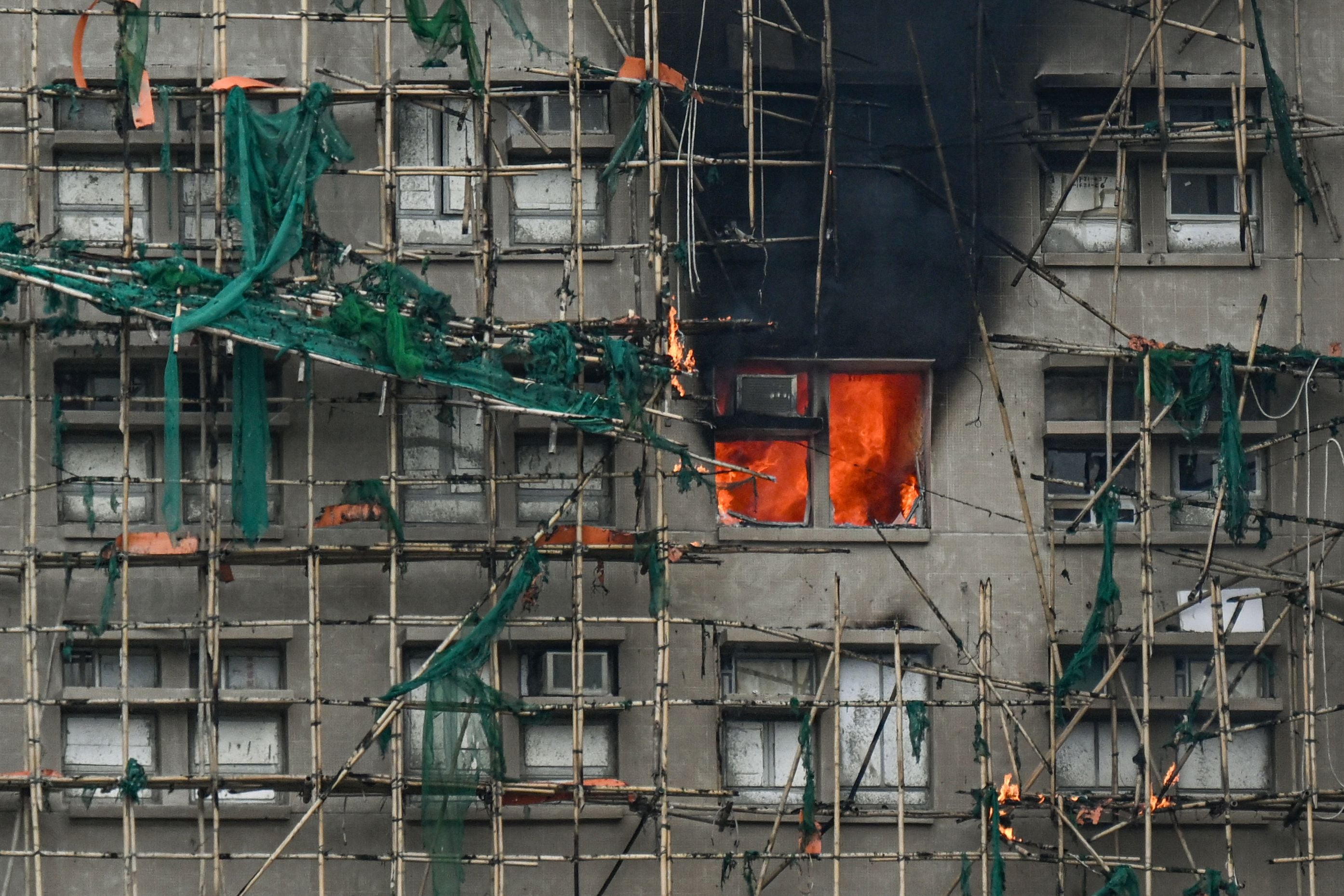 Hong Kong tower fire toll rises to 128 with 200 still missing | The ...
