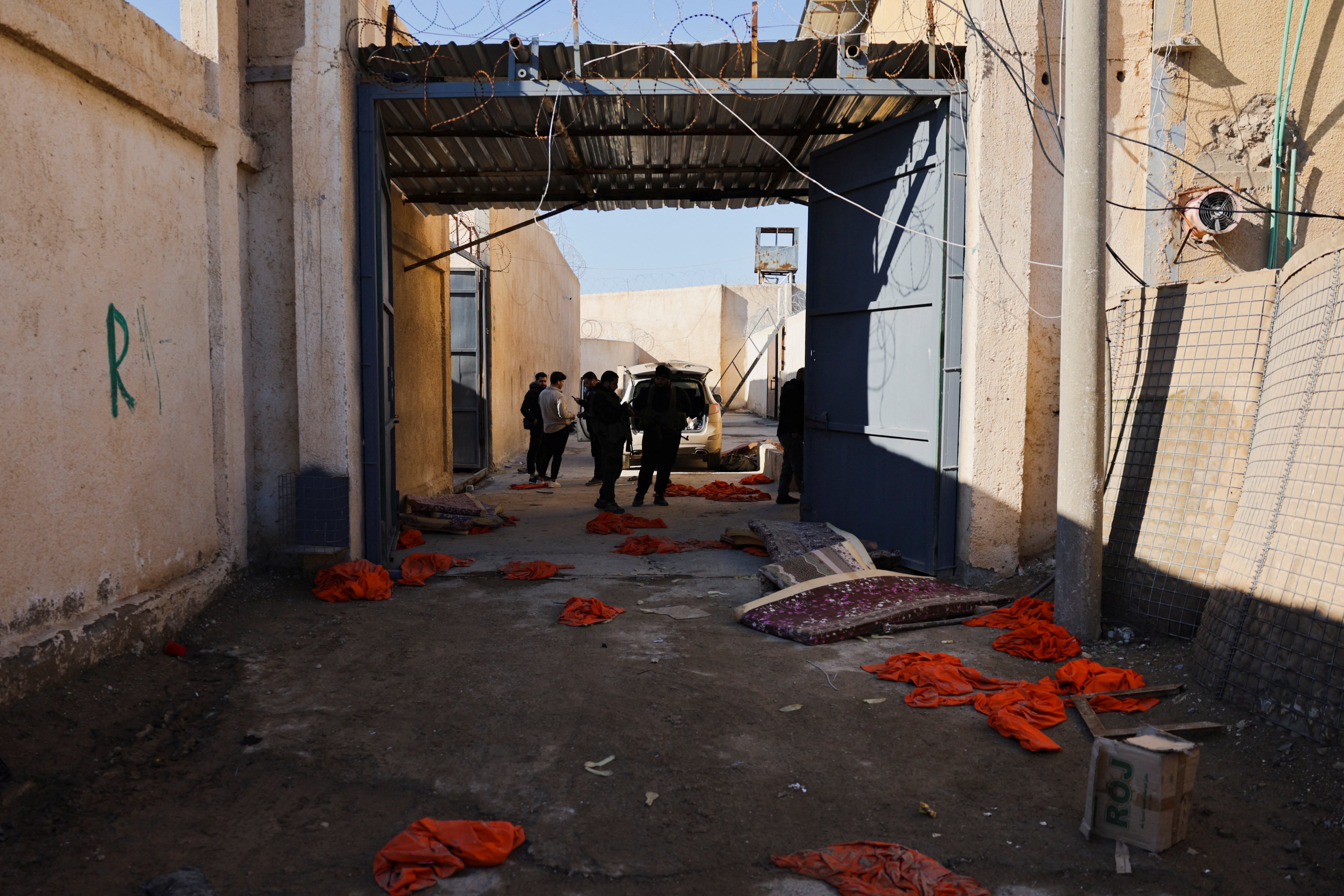 Orange uniforms, empty cells and bullets: Inside Syria’s Shaddadi ...