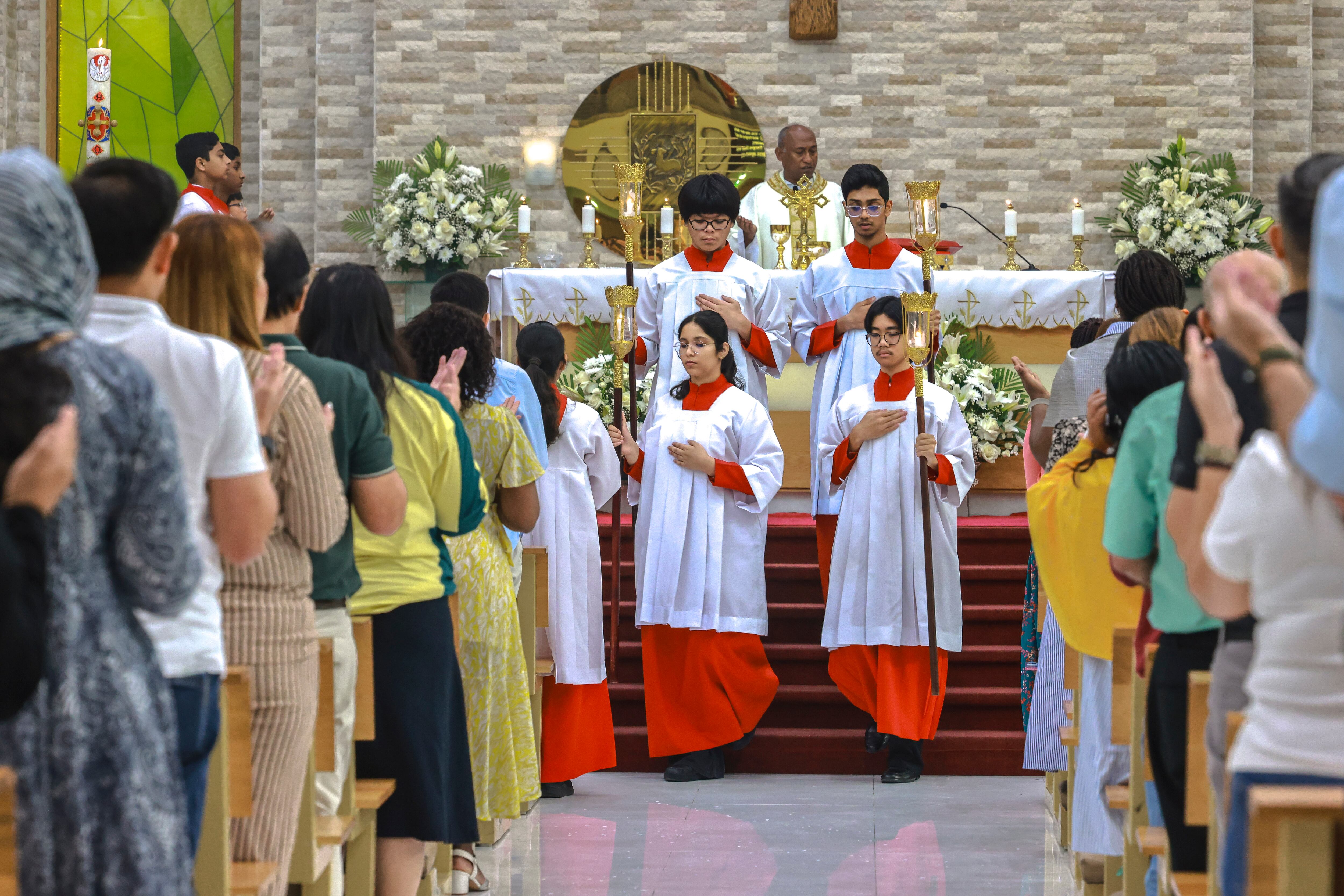Easter worshippers gather in Sharjah churches to pray for peace amid ...