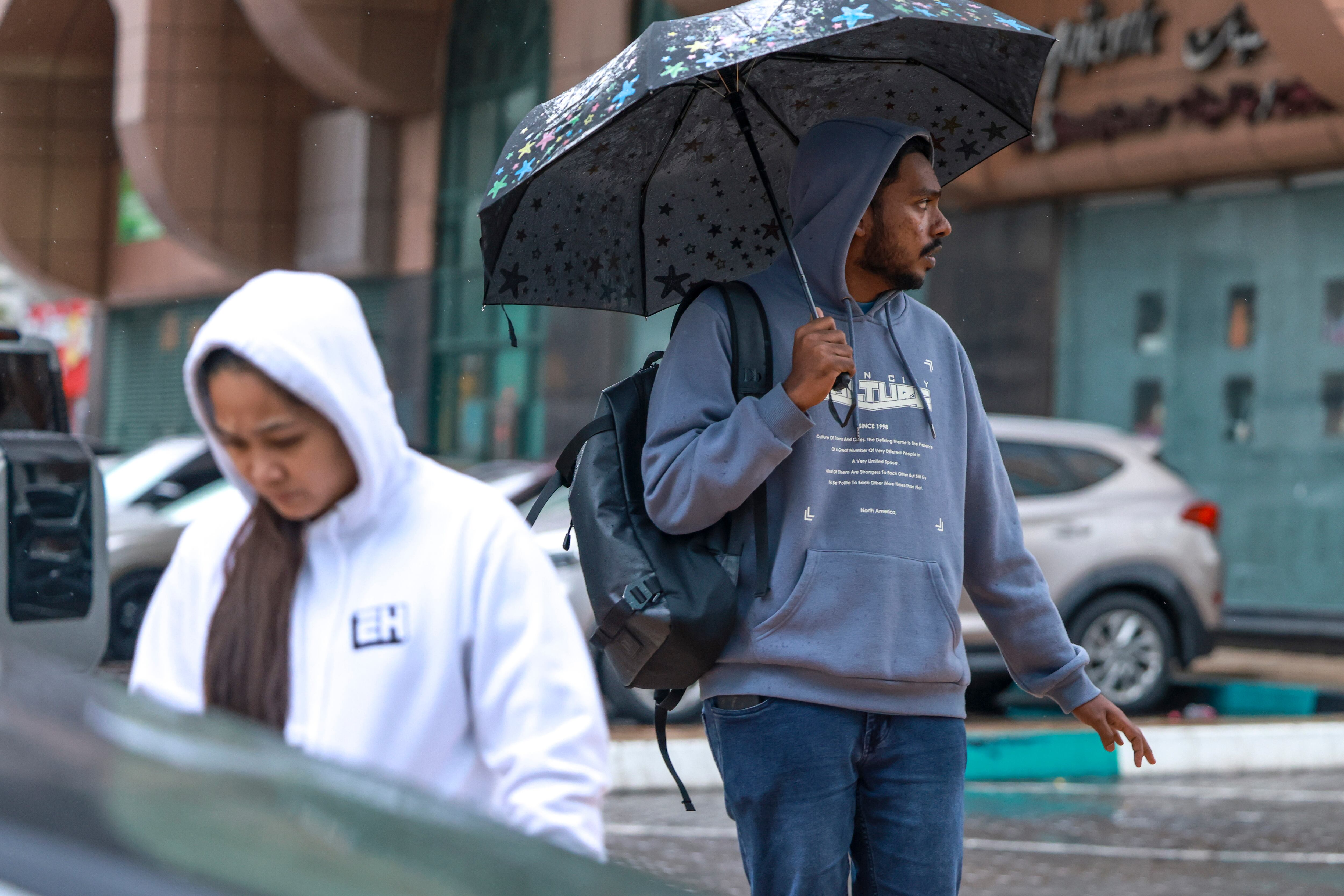 Abu Dhabi and Ajman hit by year's worth of rain in a day – with more ...
