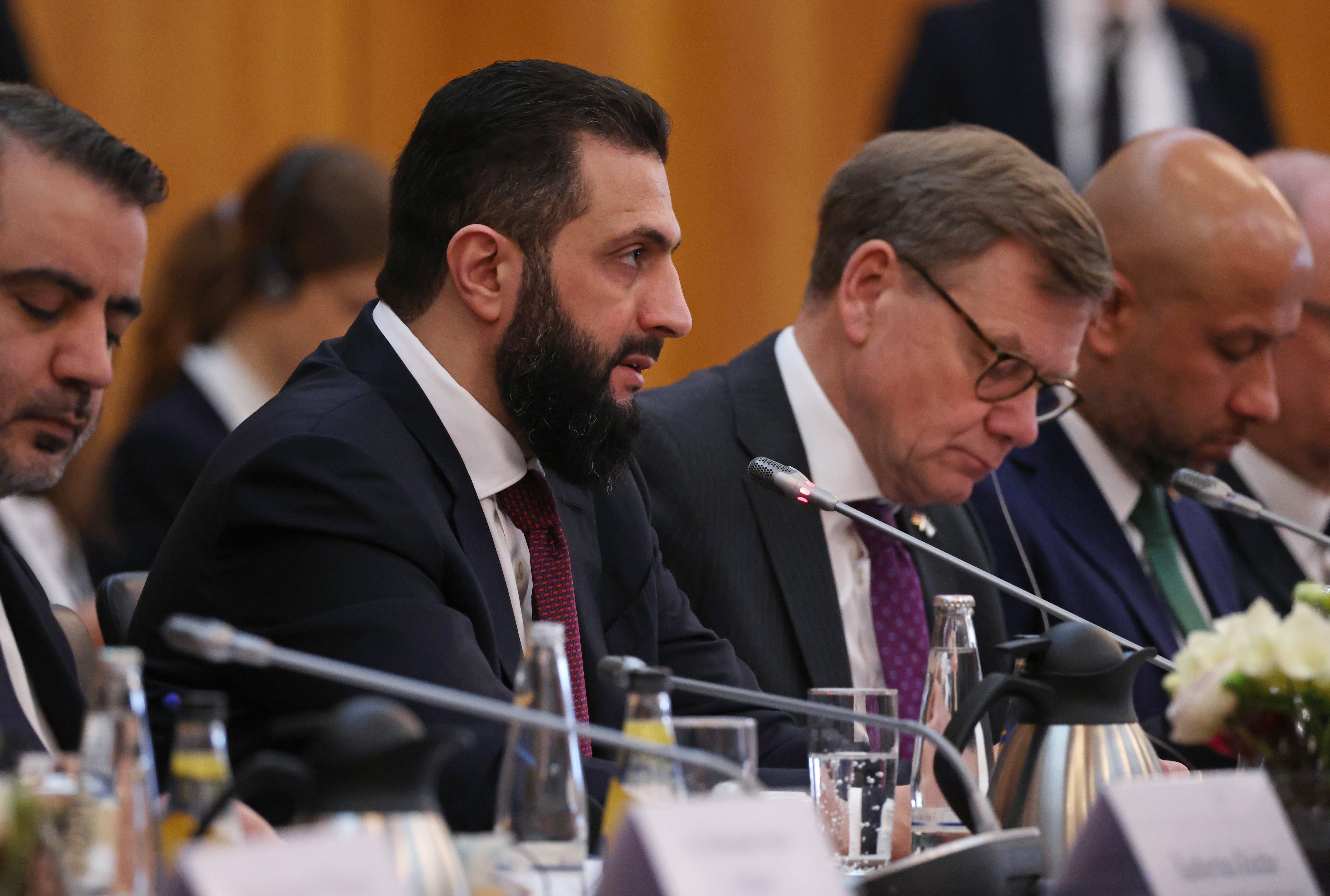 Al Shara discusses next move for Germany's Syrian refugees on visit to ...