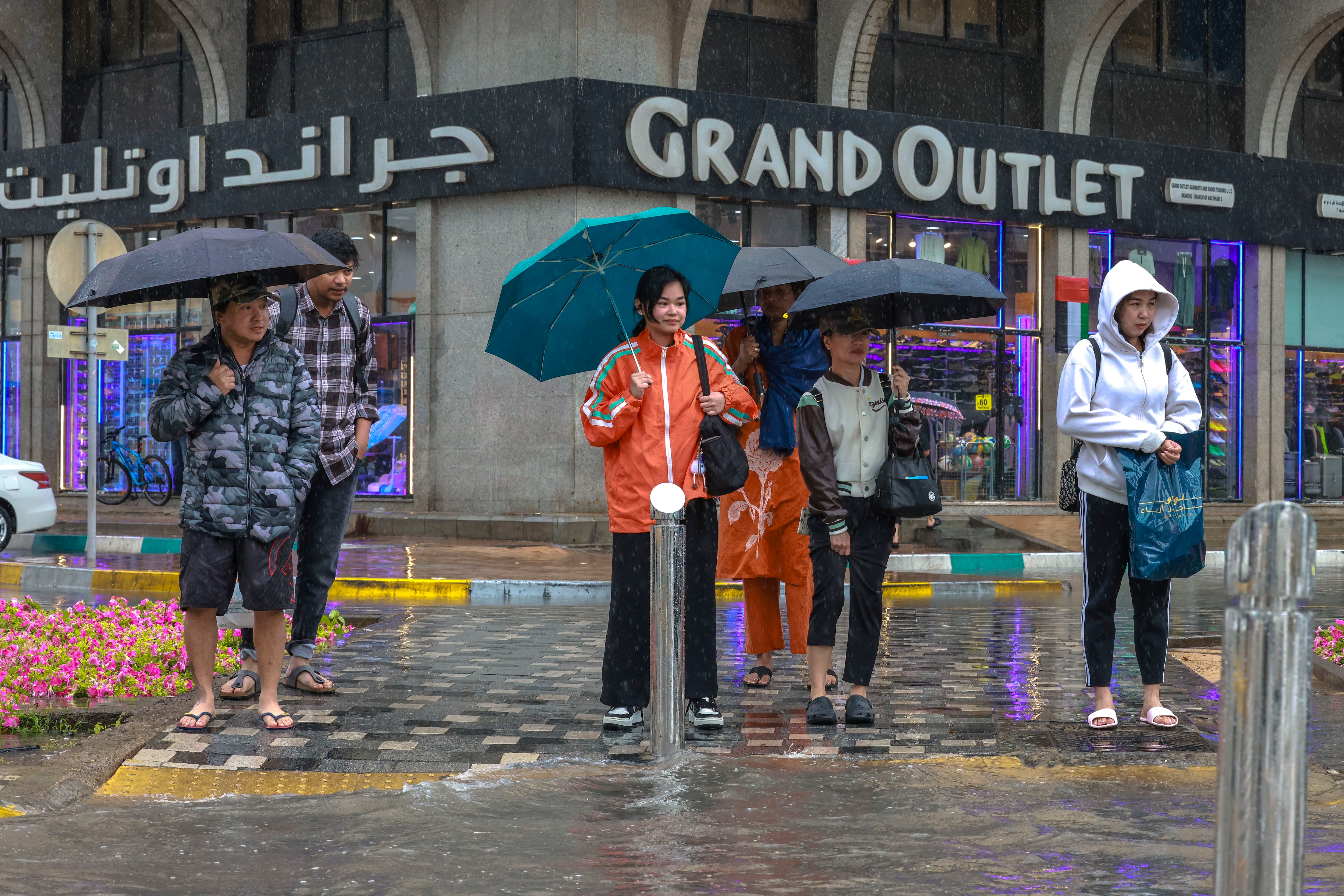 Abu Dhabi and Ajman hit by year's worth of rain in a day – with more ...