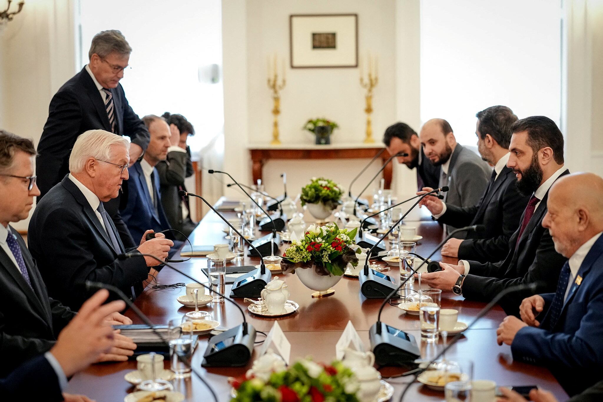 Al Shara discusses next move for Germany's Syrian refugees on visit to ...