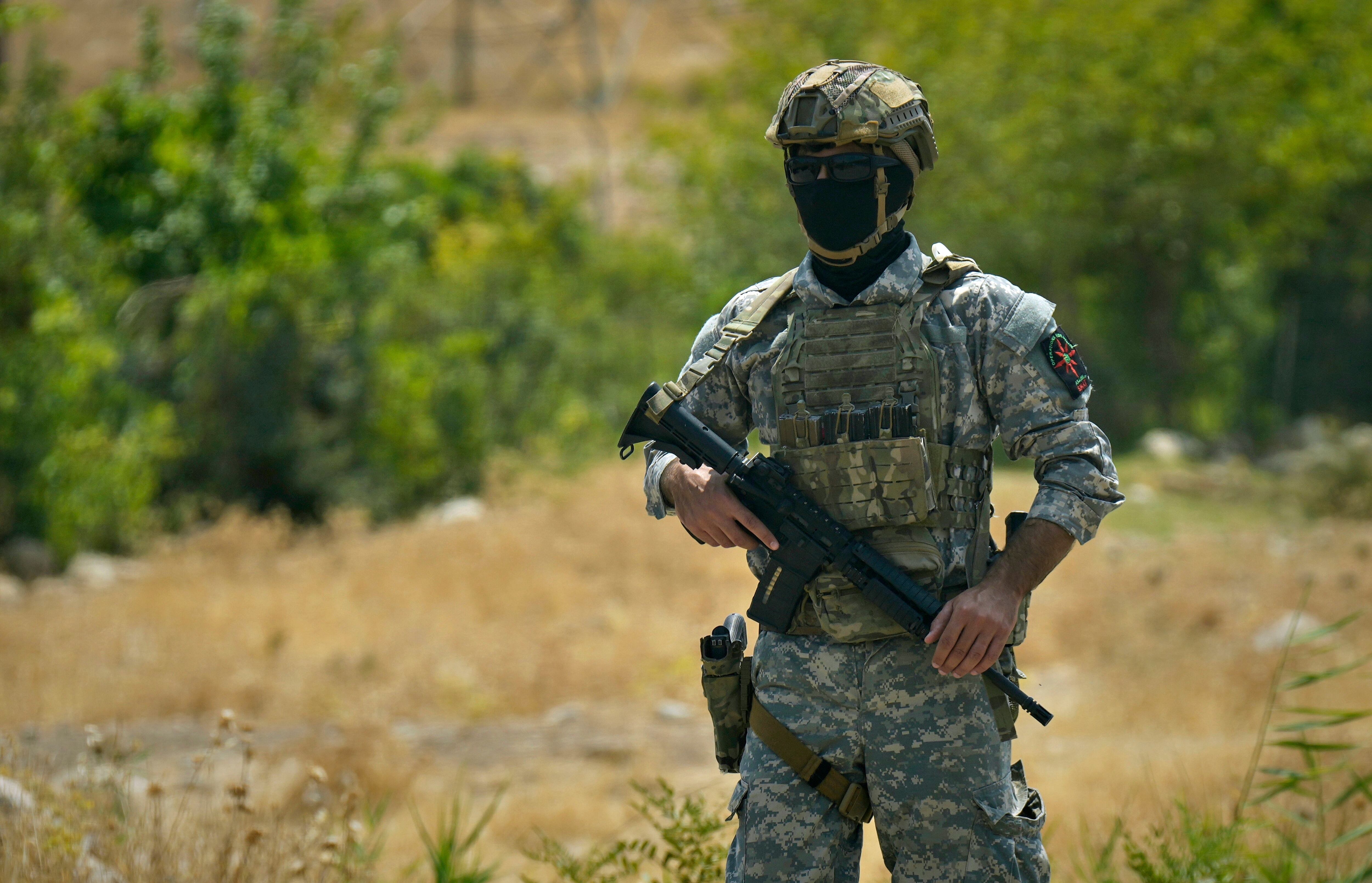 PKK fighters begin laying down weapons at symbolic ceremony | The National